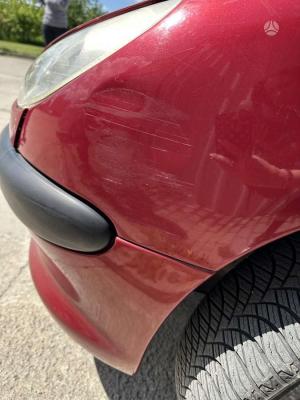Sarkans Peugeot 206 2004 Rokiškis, ar dzinēja tilpumu 1.40 L un nobraukumu 271 tūkst. km par 300 €, foto 9 vietnē AUTOMOTO.COM.LV