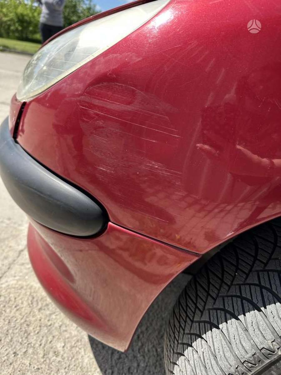 Sarkans Peugeot 206 2004 Rokiškis, ar dzinēja tilpumu 1.40 L un nobraukumu 271 tūkst. km par 300 €, foto 9 vietnē AUTOMOTO.COM.LV