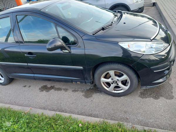 Black Peugeot 207 2008 in Alytus, with an engine capacity of 1.36 L and mileage of 222 thousand km for 950 €, photo 7 on AUTOMOTO.COM.LV