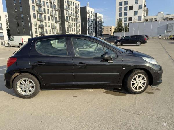 Black Peugeot 207 2009 in Vilnius, with an engine capacity of 1.56 L and mileage of 270 thousand km for 997 €, photo 6 on AUTOMOTO.COM.LV