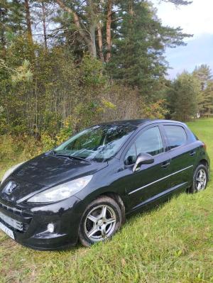Black Peugeot 207 2011 in Talsi, with an engine capacity of 1.40 L and mileage of 149 thousand km for 1300 €, photo 1 on AUTOMOTO.COM.LV
