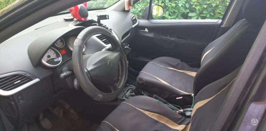 Melns Peugeot 207 2010 Klaipėda, ar dzinēja tilpumu 1.40 L un nobraukumu 33 tūkst. km par 850 €, foto 7 vietnē AUTOMOTO.COM.LV