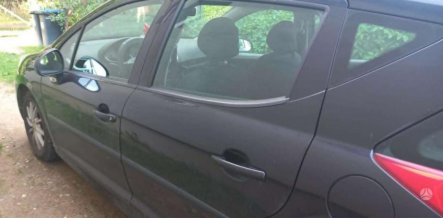 Melns Peugeot 207 2010 Klaipėda, ar dzinēja tilpumu 1.40 L un nobraukumu 33 tūkst. km par 850 €, foto 10 vietnē AUTOMOTO.COM.LV