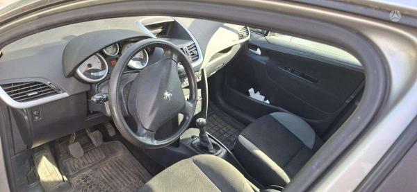 Grey Peugeot 207 2007 in Vilnius, with an engine capacity of 1.40 L and mileage of 116 thousand km for 470 €, photo 8 on AUTOMOTO.COM.LV