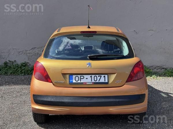 Orange Peugeot 207 2006 in Riga, with an engine capacity of 1.40 L and mileage of 203 thousand km for 690 €, photo 6 on AUTOMOTO.COM.LV