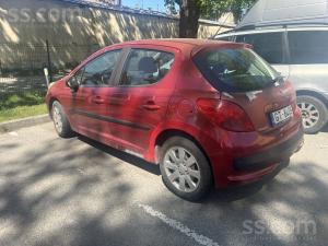 Red Peugeot 207 2007 in Riga, with an engine capacity of 1.40 L and mileage of 186 thousand km for 1200 €, photo 1 on AUTOMOTO.COM.LV