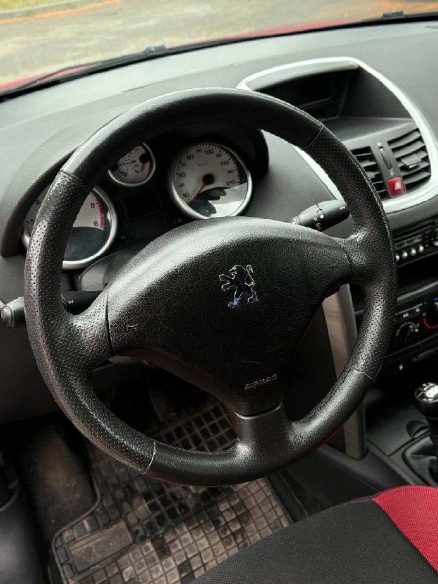 Sarkans Peugeot 207 2007 Rīga, ar dzinēja tilpumu 1.40 L un nobraukumu 236 tūkst. km par 1950 €, foto 9 vietnē AUTOMOTO.COM.LV