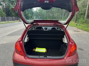 Sarkans Peugeot 207 2009 Rīga, ar dzinēja tilpumu 1.40 L un nobraukumu 133 tūkst. km par 800 €, foto 10 vietnē AUTOMOTO.COM.LV