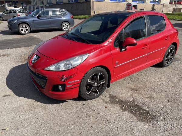 Red Peugeot 207 2010 in Riga, with an engine capacity of 1.60 L and mileage of 205 thousand km for 1666 €, photo 1 on AUTOMOTO.COM.LV