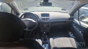 White Peugeot 207 2010 in Riga, with an engine capacity of 1.40 L and mileage of 325 thousand km for 700 €, photo 5 on AUTOMOTO.COM.LV