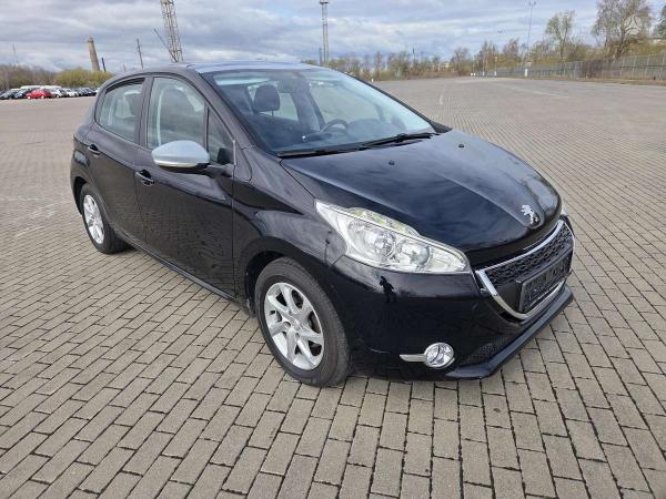 Black Peugeot 208 2013 in Marijampole, with an engine capacity of 1.20 L and mileage of 147 thousand km for 1950 €, photo 6 on AUTOMOTO.COM.LV