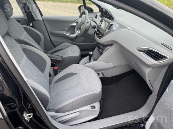 Black Peugeot 208 2014 in Ogre, with an engine capacity of 1.60 L and mileage of 144 thousand km for 5299 €, photo 8 on AUTOMOTO.COM.LV