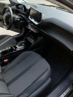 Black Peugeot 208 2021 in Vilnius, with an engine capacity of 1.20 L and mileage of 33 thousand km for 14300 €, photo 12 on AUTOMOTO.COM.LV