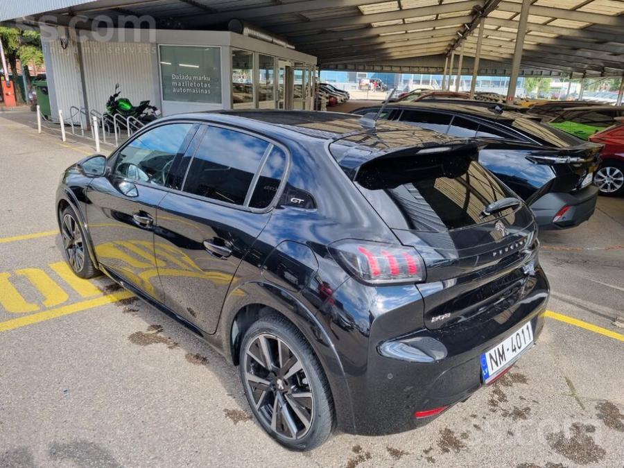 Black Peugeot 208 2023 in Riga, with an engine capacity of 1.20 L and mileage of 54 thousand km for 14500 €, photo 4 on AUTOMOTO.COM.LV
