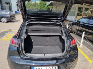 Black Peugeot 208 2023 in Riga, with an engine capacity of 1.20 L and mileage of 54 thousand km for 14500 €, photo 6 on AUTOMOTO.COM.LV