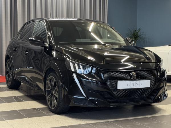 Black Peugeot 208 2023 in Riga, with an engine capacity of 1.20 L and mileage of 37 thousand km for 14990 €, photo 4 on AUTOMOTO.COM.LV