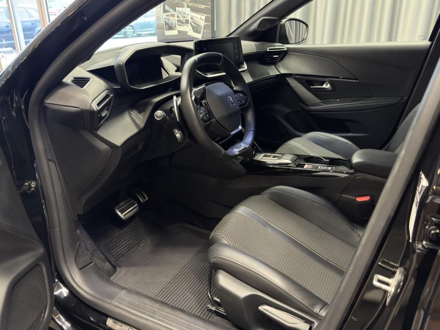 Black Peugeot 208 2023 in Riga, with an engine capacity of 1.20 L and mileage of 37 thousand km for 14990 €, photo 15 on AUTOMOTO.COM.LV