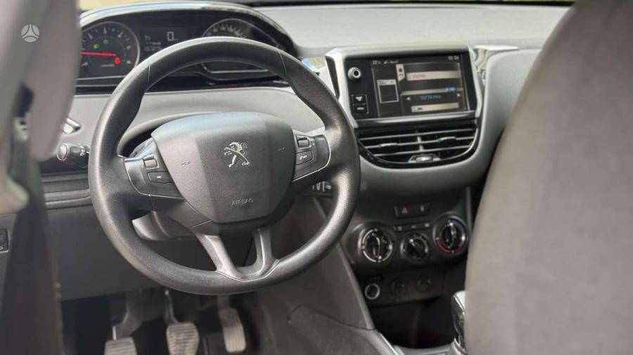 Blue Peugeot 208 2015 in Vilnius, with an engine capacity of 1.40 L and mileage of 158 thousand km for 2950 €, photo 10 on AUTOMOTO.COM.LV