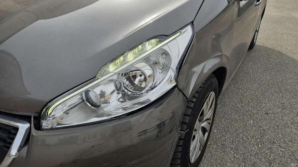 Brown Peugeot 208 2014 in Rokiskis, with an engine capacity of 1.20 L and mileage of 60 thousand km for 4100 €, photo 10 on AUTOMOTO.COM.LV