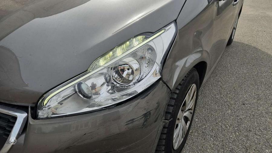 Brown Peugeot 208 2014 in Rokiskis, with an engine capacity of 1.20 L and mileage of 60 thousand km for 4100 €, photo 10 on AUTOMOTO.COM.LV