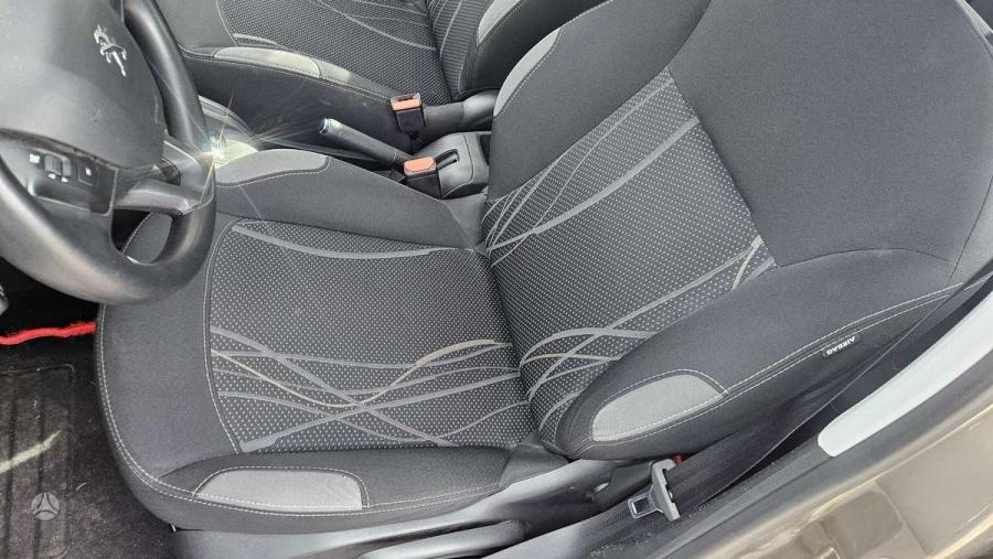 Brown Peugeot 208 2014 in Rokiskis, with an engine capacity of 1.20 L and mileage of 60 thousand km for 4100 €, photo 12 on AUTOMOTO.COM.LV