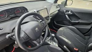 Brown Peugeot 208 2014 in Rokiskis, with an engine capacity of 1.20 L and mileage of 60 thousand km for 4100 €, photo 13 on AUTOMOTO.COM.LV