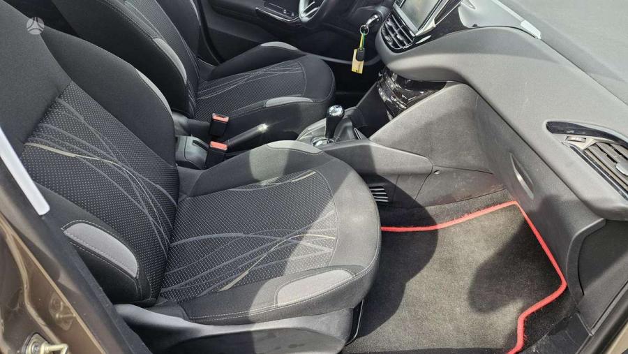 Brown Peugeot 208 2014 in Rokiskis, with an engine capacity of 1.20 L and mileage of 60 thousand km for 4100 €, photo 18 on AUTOMOTO.COM.LV