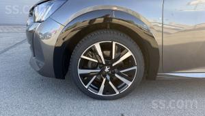 Grey Peugeot 208 2023 in Riga, with an engine capacity of 1.20 L and mileage of 53 thousand km for 14990 €, photo 3 on AUTOMOTO.COM.LV
