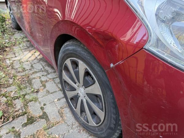 Red Peugeot 208 2012 in Riga, with an engine capacity of 1.40 L and mileage of 256 thousand km for 2750 €, photo 6 on AUTOMOTO.COM.LV