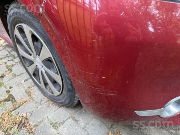 Red Peugeot 208 2012 in Riga, with an engine capacity of 1.40 L and mileage of 256 thousand km for 2750 €, photo 7 on AUTOMOTO.COM.LV