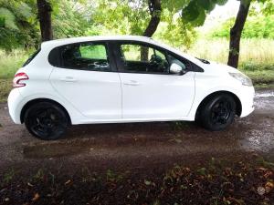 Balts Peugeot 208 2014 Vilkaviškis, ar dzinēja tilpumu 1.20 L un nobraukumu 230 tūkst. km par 2850 €, foto 9 vietnē AUTOMOTO.COM.LV