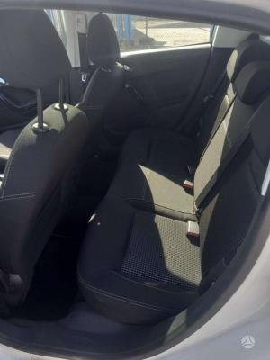 Balts Peugeot 208 2015 Panevēža, ar dzinēja tilpumu 1.20 L un nobraukumu 109 tūkst. km par 3850 €, foto 12 vietnē AUTOMOTO.COM.LV