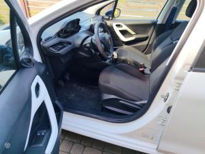 White Peugeot 208 2016 in Panevezys, with an engine capacity of 1.00 L and mileage of 155 thousand km for 3900 €, photo 22 on AUTOMOTO.COM.LV