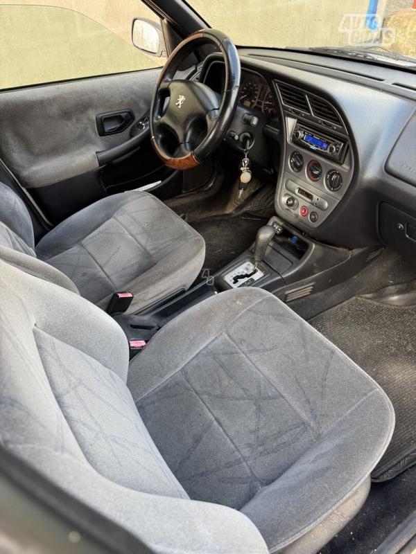 Grey Peugeot 306 2000 in Siauliai, with an engine capacity of 2.00 L and mileage of 260 thousand km for 750 €, photo 9 on AUTOMOTO.COM.LV
