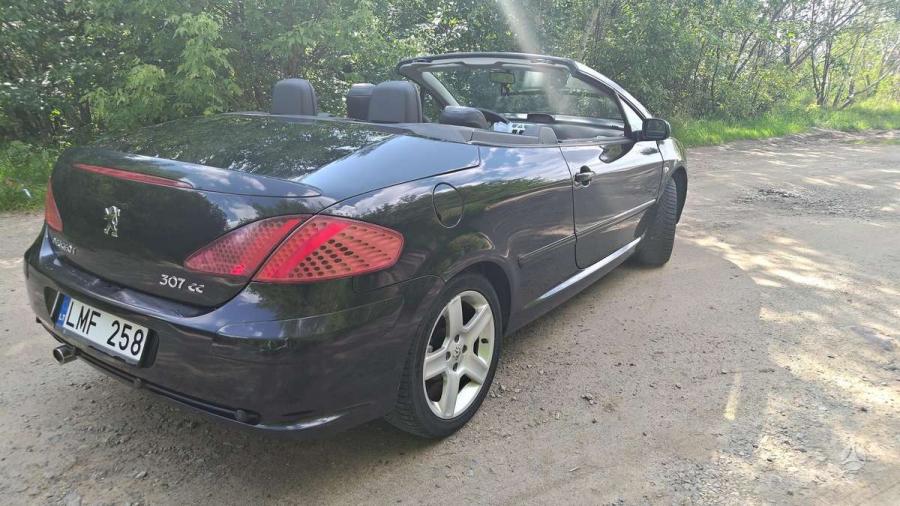 Black Peugeot 307 2005 in Vilnius, with an engine capacity of 1.59 L and mileage of 150 thousand km for 2100 €, photo 17 on AUTOMOTO.COM.LV