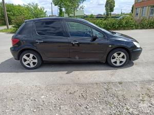 Black Peugeot 307 2004 in Vilnius, with an engine capacity of 2.00 L and mileage of 304 thousand km for 700 €, photo 5 on AUTOMOTO.COM.LV