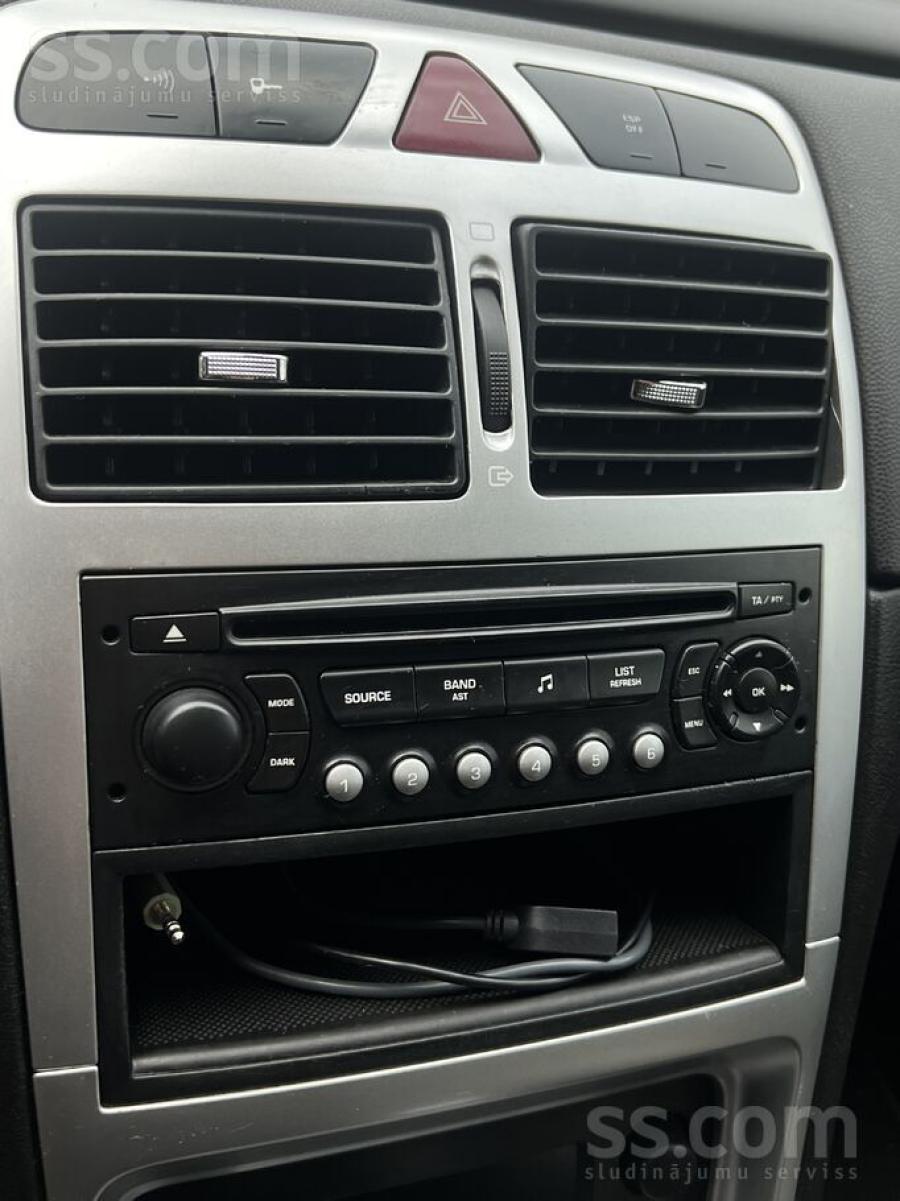 Black Peugeot 307 2007 in Riga, with an engine capacity of 1.60 L and mileage of 169 thousand km for 1750 €, photo 12 on AUTOMOTO.COM.LV