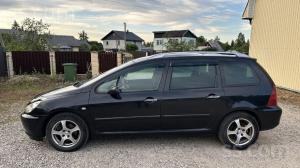 Black Peugeot 307 2003 in Rezekne, with an engine capacity of 2.00 L and mileage of 322 thousand km for 1350 €, photo 2 on AUTOMOTO.COM.LV