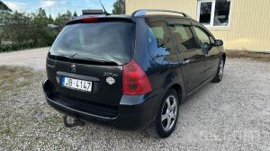 Black Peugeot 307 2003 in Rezekne, with an engine capacity of 2.00 L and mileage of 322 thousand km for 1350 €, photo 4 on AUTOMOTO.COM.LV