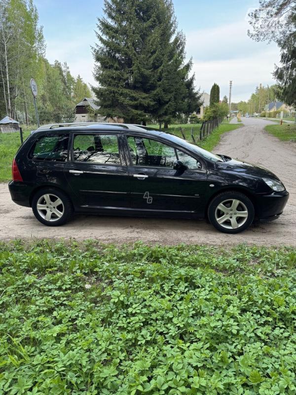 Black Peugeot 307 2005 in Kazlu Ruda, with an engine capacity of 1.60 L and mileage of 273 thousand km for 1200 €, photo 6 on AUTOMOTO.COM.LV