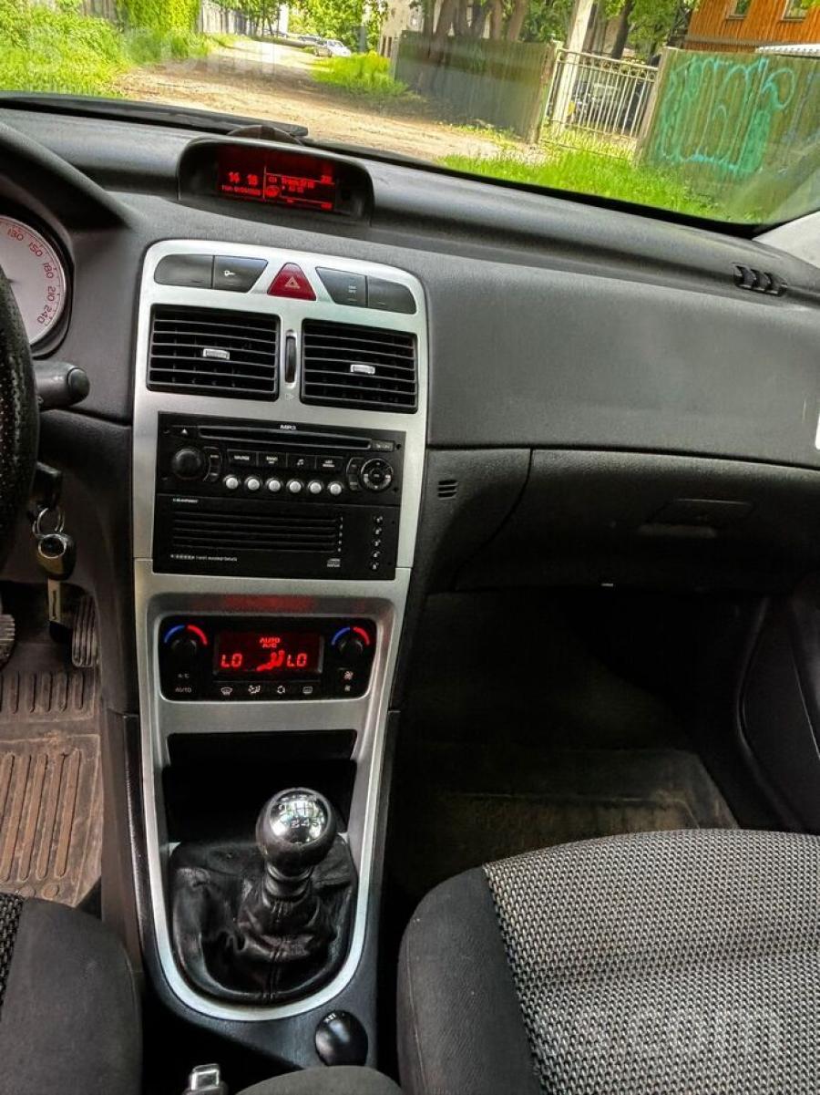Zils Peugeot 307 2006 Rīga, ar dzinēja tilpumu 2.00 L un nobraukumu 267 tūkst. km par 1500 €, foto 12 vietnē AUTOMOTO.COM.LV