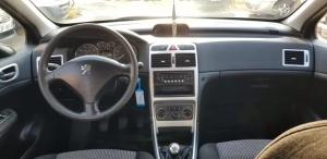 Brown Peugeot 307 2006 in Valmiera, with an engine capacity of 1.40 L and mileage of 382 thousand km for 1500 €, photo 10 on AUTOMOTO.COM.LV