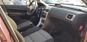 Brown Peugeot 307 2006 in Valmiera, with an engine capacity of 1.40 L and mileage of 382 thousand km for 1500 €, photo 12 on AUTOMOTO.COM.LV
