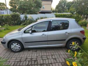 Grey Peugeot 307 2001 in Kaunas, with an engine capacity of 2.00 L and mileage of 268 thousand km for 550 €, photo 5 on AUTOMOTO.COM.LV