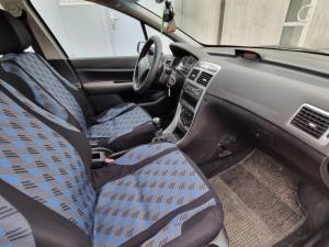 Pelēks Peugeot 307 2003 Rīga, ar dzinēja tilpumu 1.40 L un nobraukumu 296 tūkst. km par 1100 €, foto 12 vietnē AUTOMOTO.COM.LV