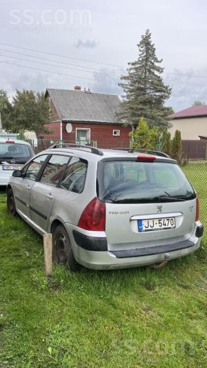 Pelēks Peugeot 307 2002 Daugavpils, ar dzinēja tilpumu 2.00 L un nobraukumu 322 tūkst. km par 800 €, foto 4 vietnē AUTOMOTO.COM.LV