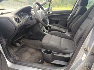 Grey Peugeot 307 2002 in Daugavpils, with an engine capacity of 2.00 L and mileage of 268 thousand km for 1050 €, photo 14 on AUTOMOTO.COM.LV