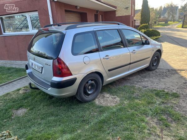Pelēks Peugeot 307 2004 Šauļi, ar dzinēja tilpumu 1.60 L un nobraukumu 400 tūkst. km par 1300 €, foto 4 vietnē AUTOMOTO.COM.LV