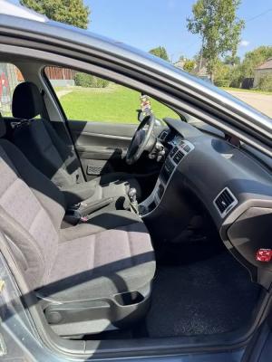 Grey Peugeot 307 2005 in Ventspils, with an engine capacity of 1.60 L and mileage of 293 thousand km for 1890 €, photo 18 on AUTOMOTO.COM.LV