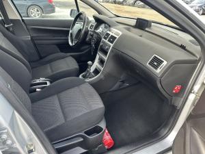 Grey Peugeot 307 2007 in Giraite, with an engine capacity of 1.60 L and mileage of 280 thousand km for 2100 €, photo 14 on AUTOMOTO.COM.LV